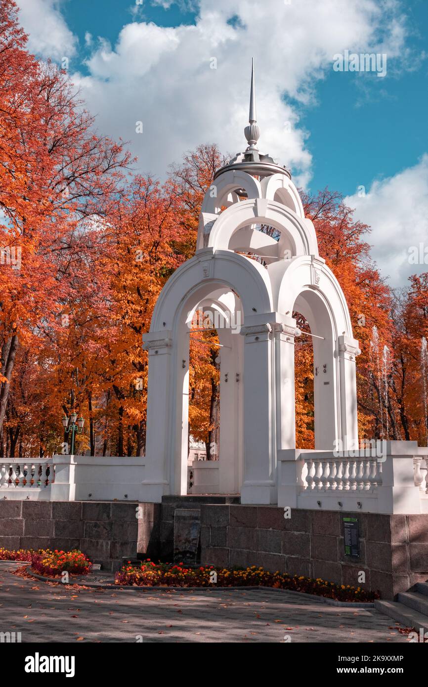 Mirror Stream alcove and fountain with autumn orange trees and blue ...