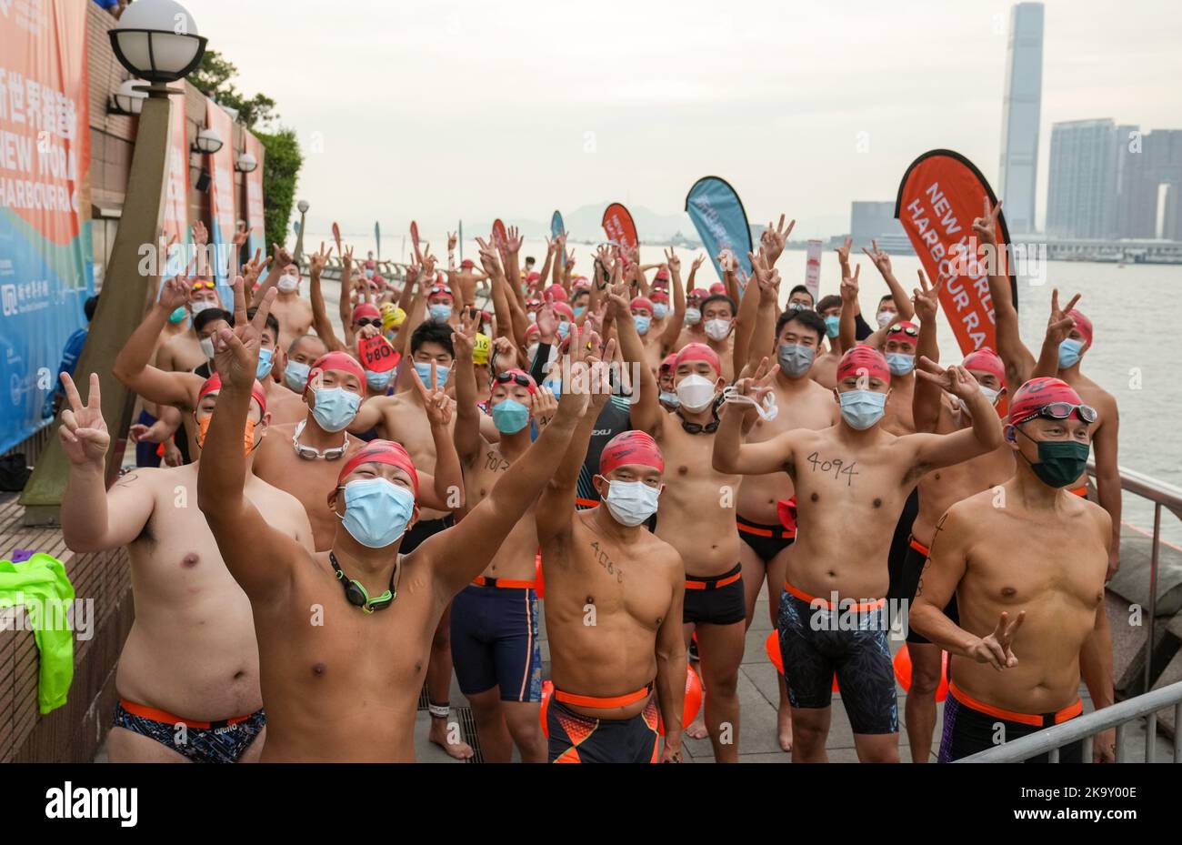 Participants at the starting point of Cross Harbour Swim Race at Golden ...