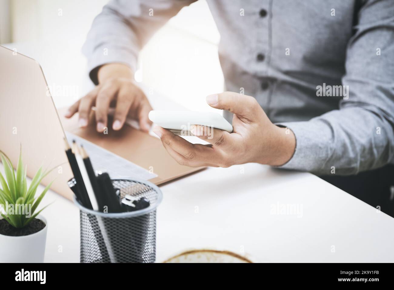 Business men are using their mobile phones to connect with their ...