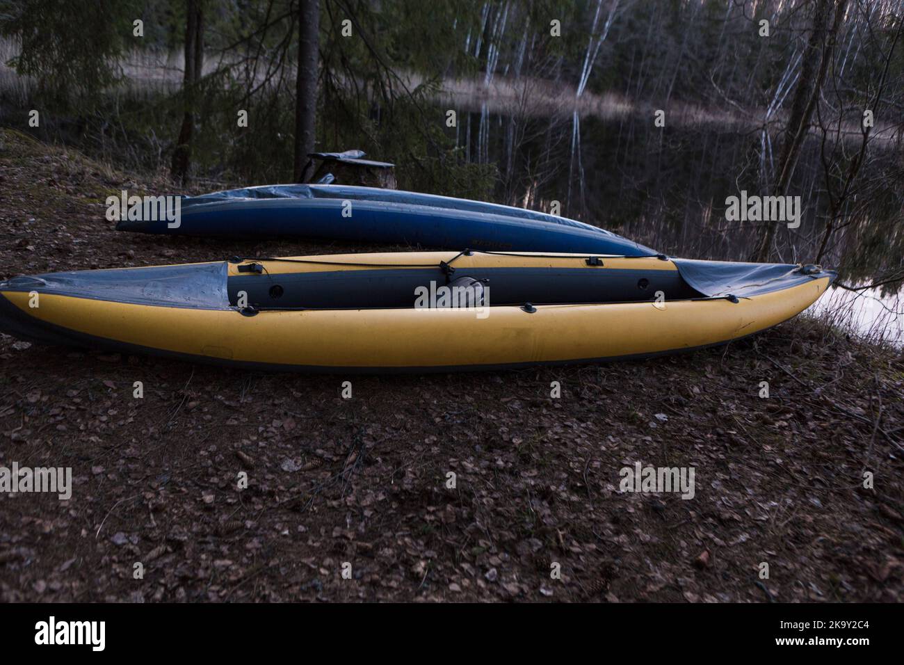 inflatable boats in the forest on the river bank Stock Photo - Alamy