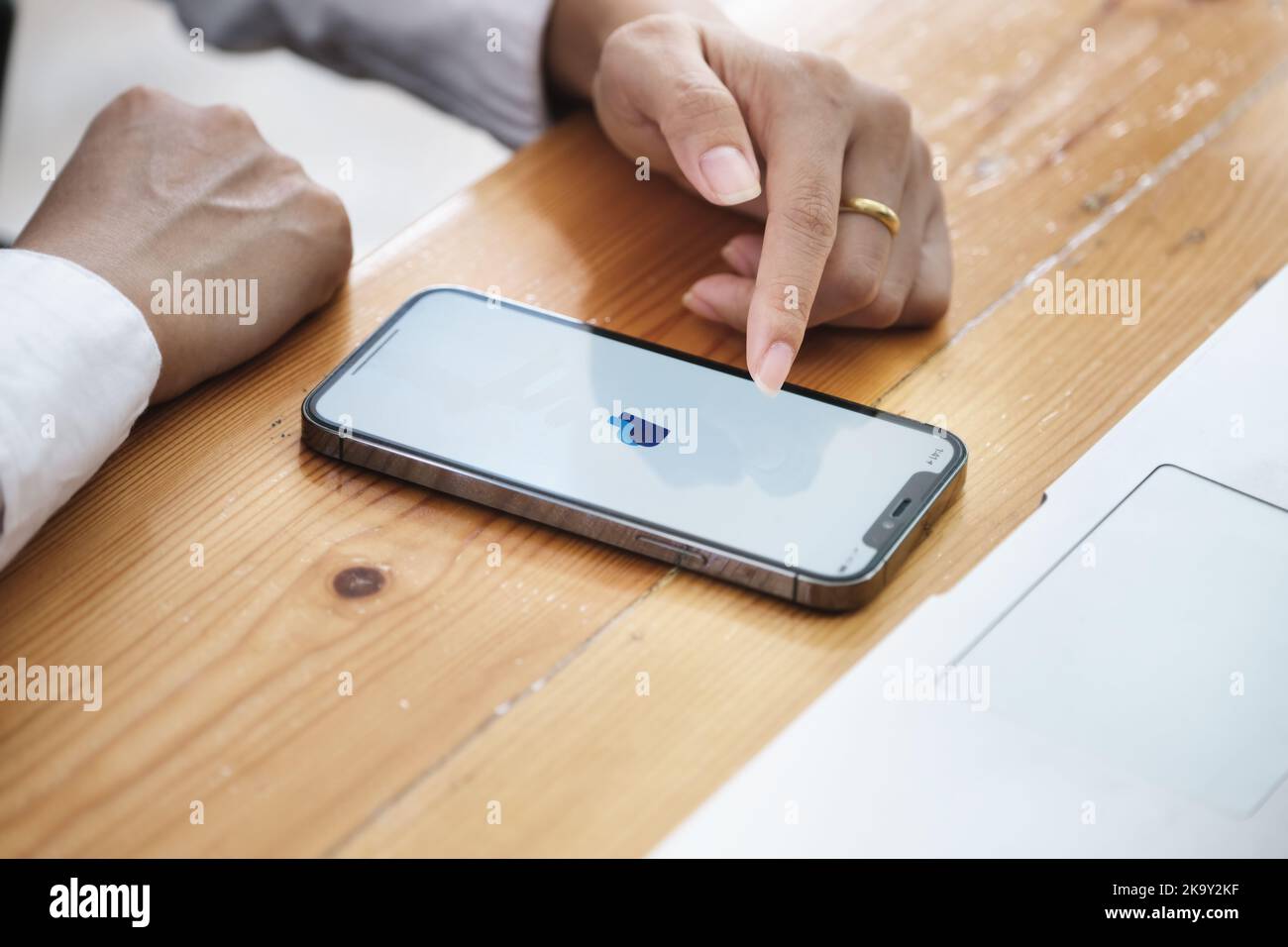 CHIANG MAI, THAILAND - MAY 30, 2021 : Women hands holding iphone with ...