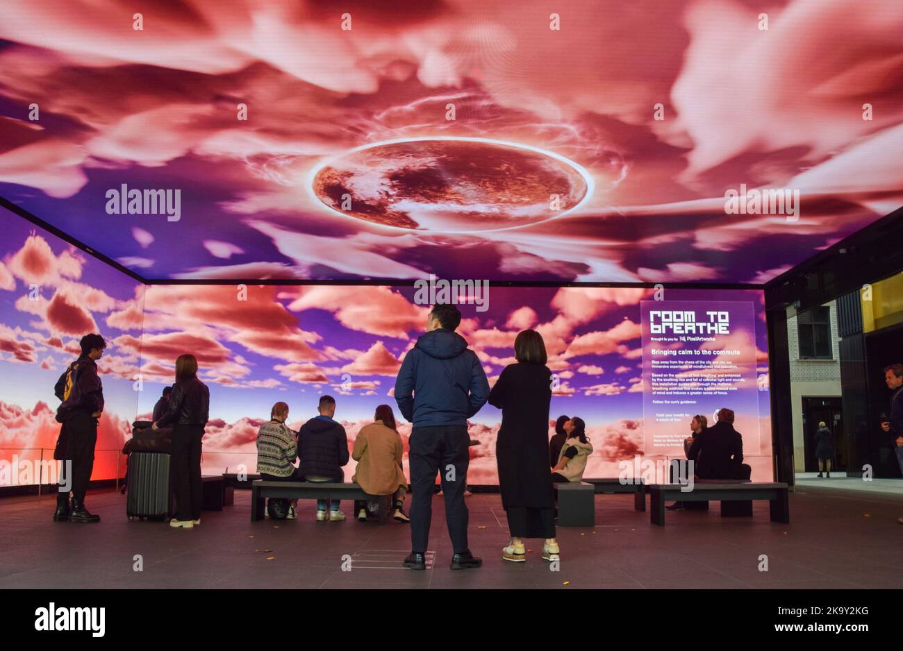 London, England, UK. 30th Oct, 2022. People enjoy the digital art on ...