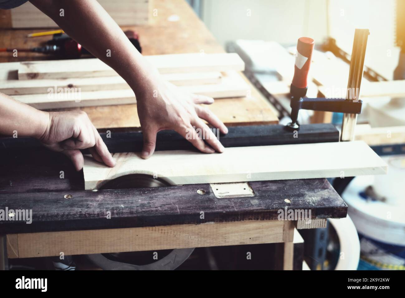 Woodworking practitioners use saw blades to cut wood pieces to assemble ...