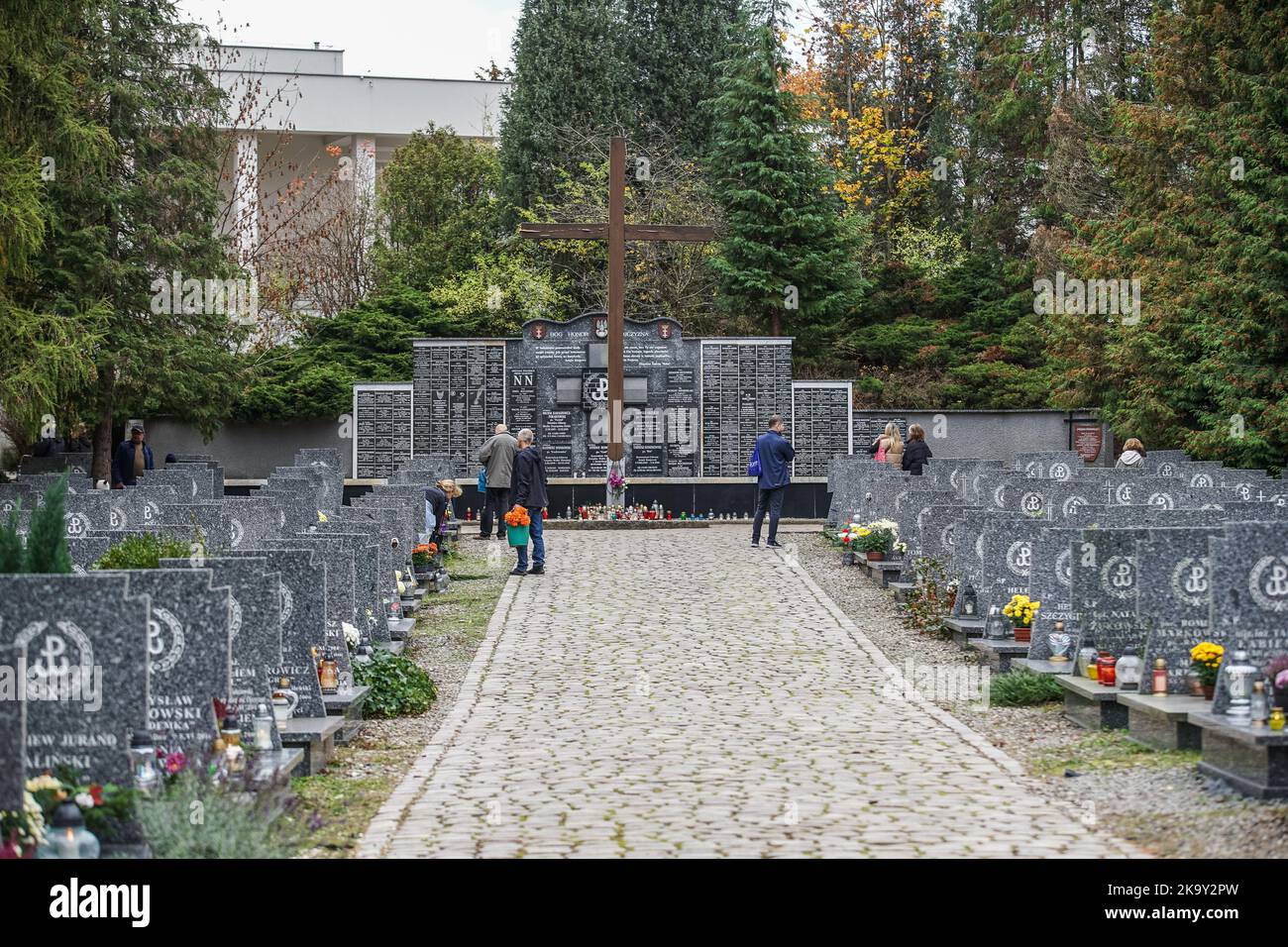 Gdansk, Poland. 30th Oct, 2022. People visiting graves of their ...