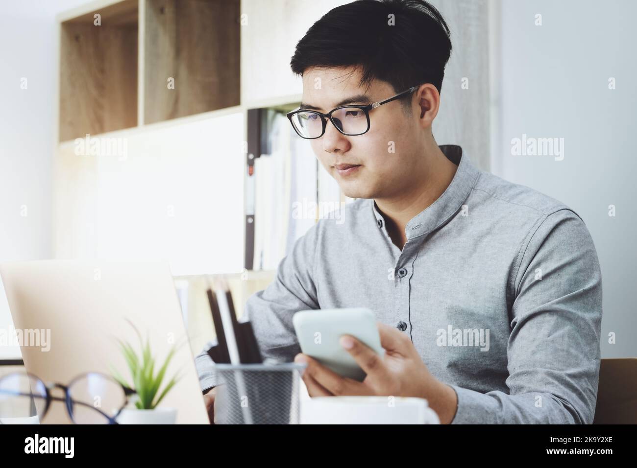 Business men are using their mobile phones to connect with their ...