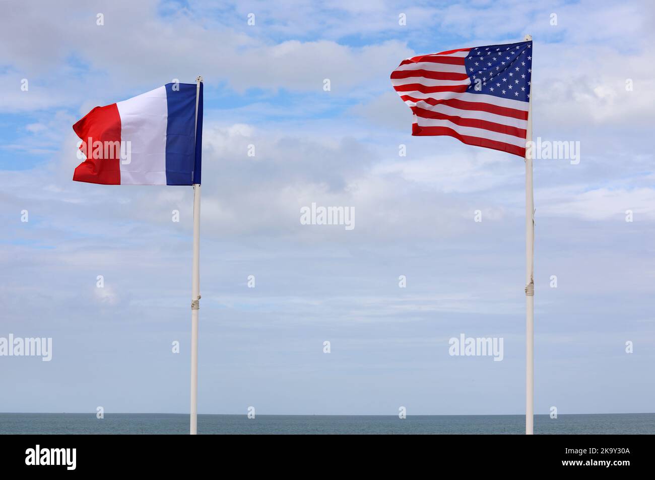 american flag and french flag in blue sky Stock Photo - Alamy