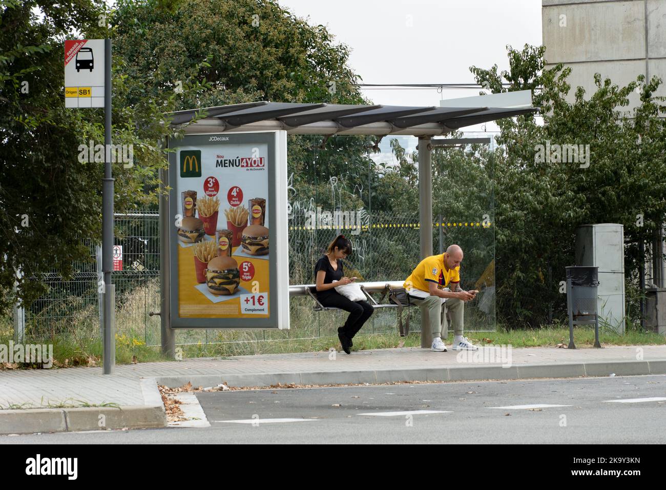Barcelona, Spain - October 23, 2022: Man and woman looking absorbed in ...