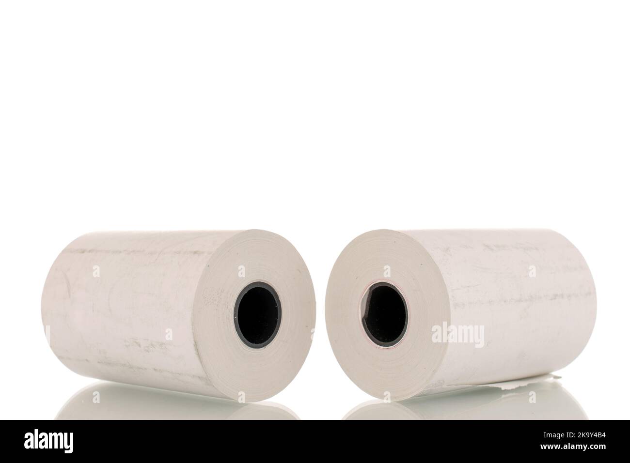 Two rolls of paper cash register tape, close-up isolated on white Stock ...