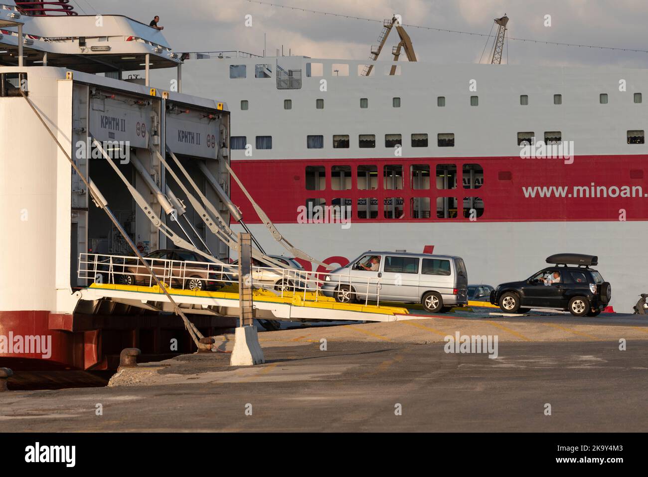 Heraklion, Crete, Greece. 2022. Motor vehicles loading onto a ferry in ...