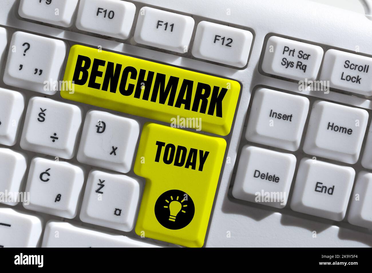 Hand writing sign Benchmark. Business concept using or able to use two ...