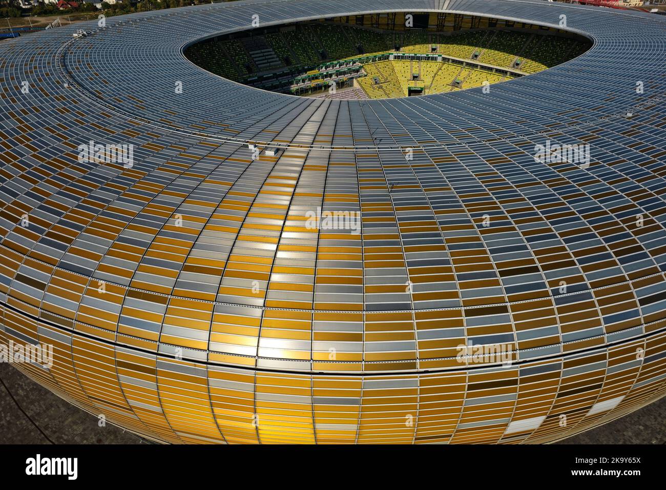 Lechia sports stadium in Gdańsk. The sun illuminates the facade of the ...