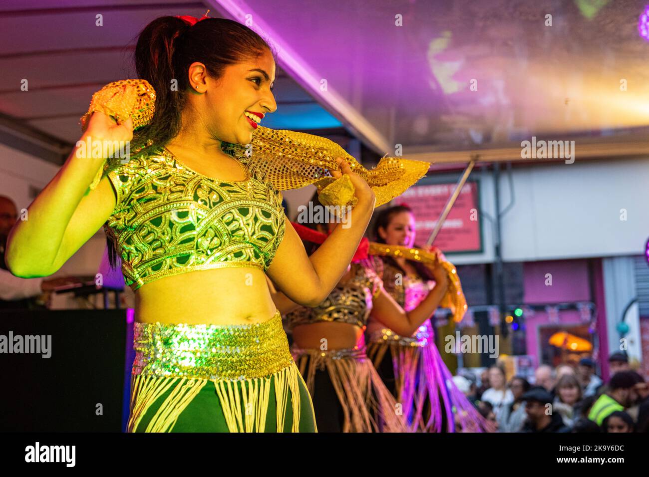 Dancers on stage in the rain for a Divali performance in Tooting ...