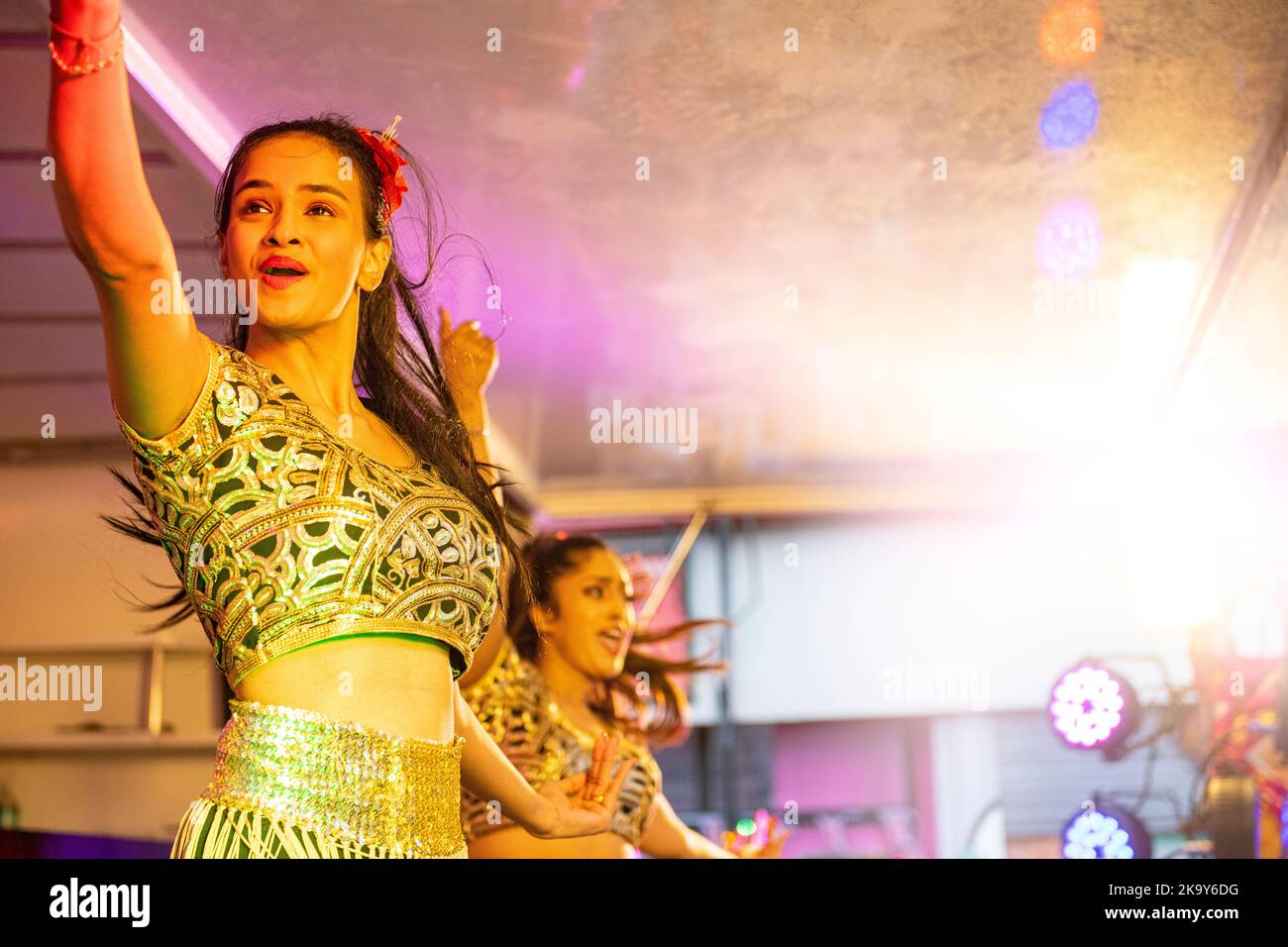 Dancers on stage in the rain for a Divali performance in Tooting ...