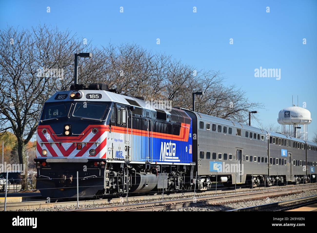 Naperville, Illinois, USA. A Metra commuter train arriving at the local suburban Chicago ...