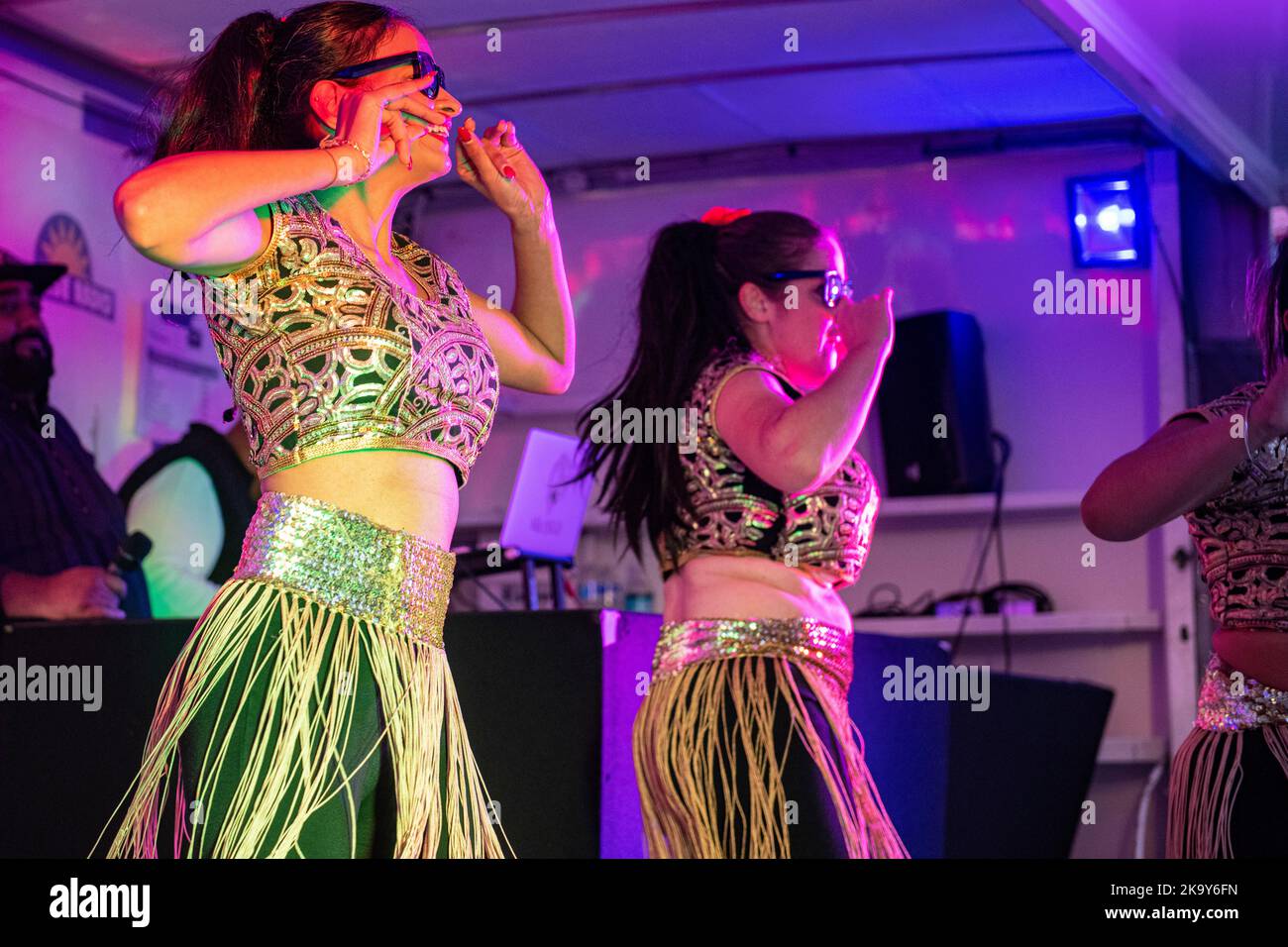 Dancers on stage in the rain for a Divali performance in Tooting ...