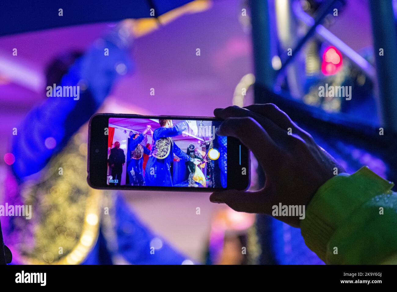 Dancers on stage in the rain for a Divali performance in Tooting ...