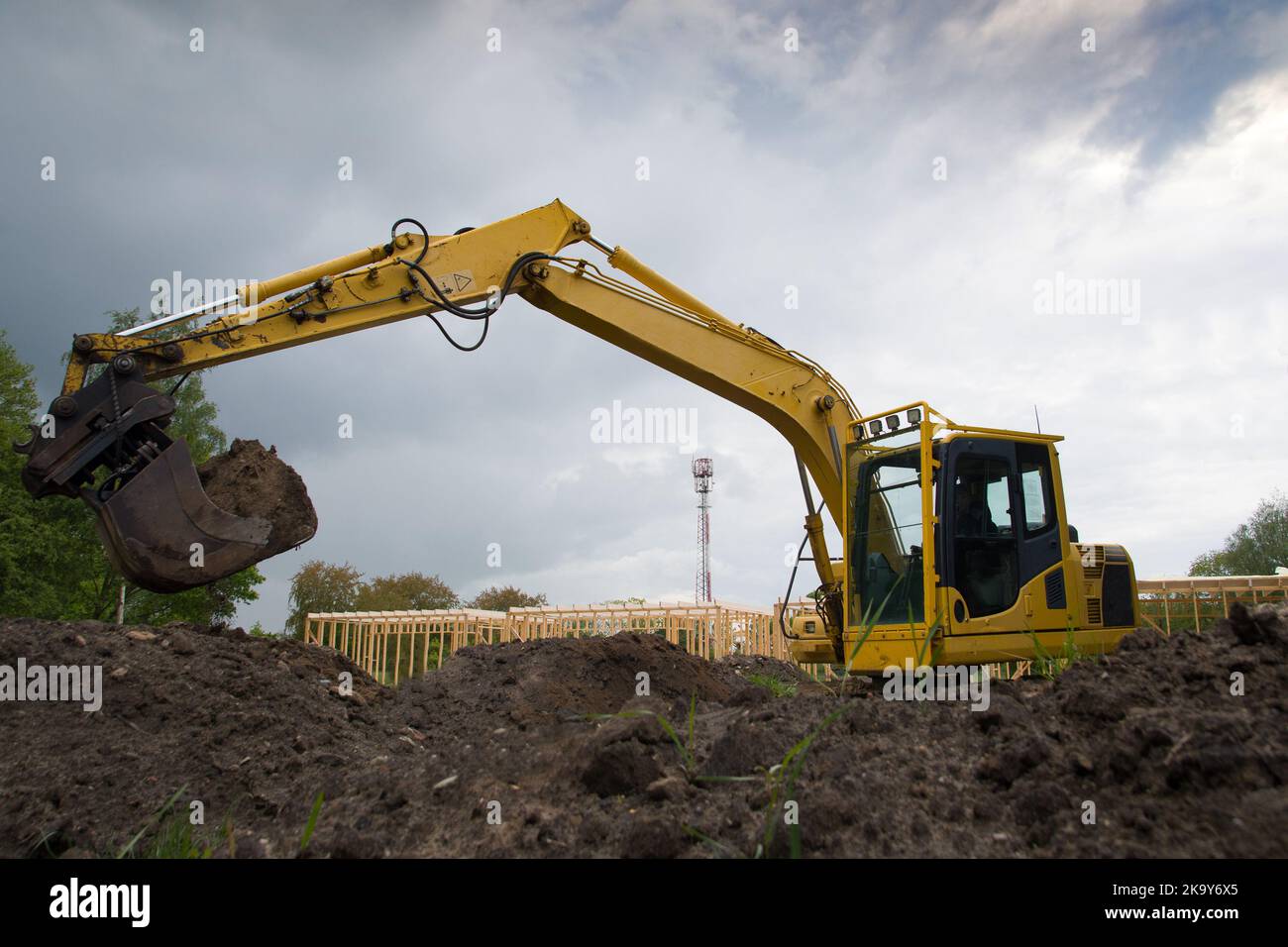 excavator at work on construction site Stock Photo - Alamy
