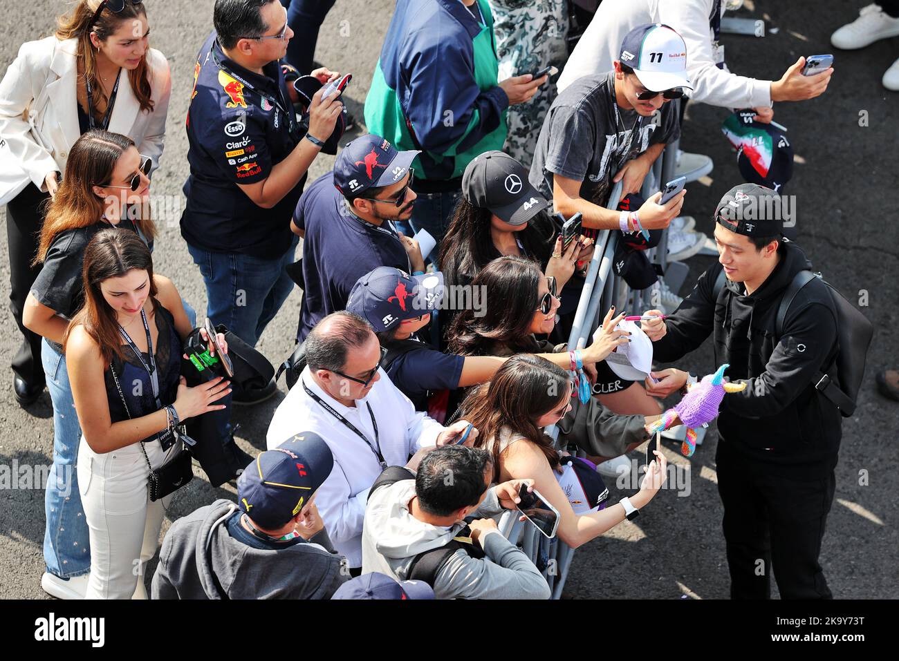 Guanyu Zhou (CHN) Alfa Romeo F1 Team with fans. Mexican Grand Prix ...
