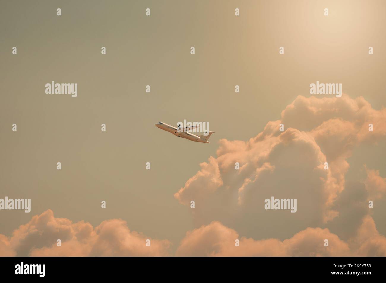 small plane rising through the clouds Stock Photo - Alamy