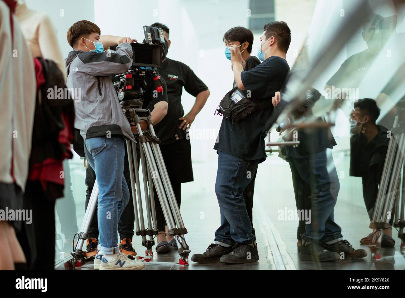 a film crew filming a music video inside museum in Vietnam Stock Photo ...