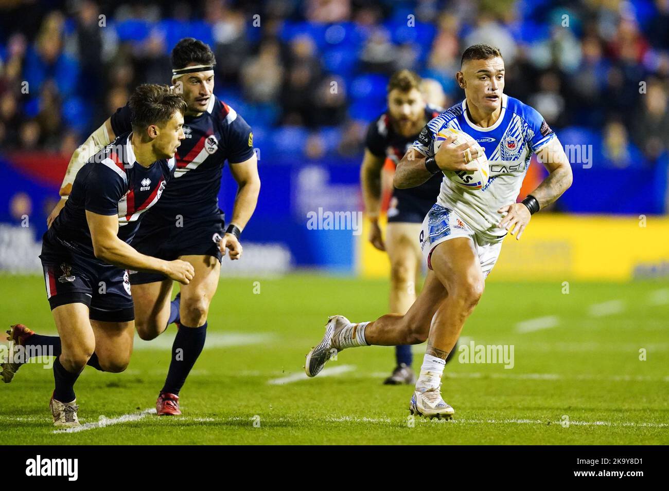 Samoa's Danny Levi (right) breaks away during the Rugby League World ...