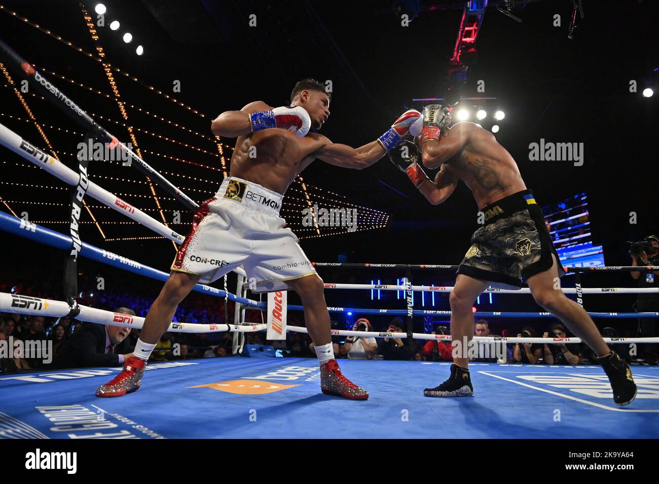 NEW YORK, NY - OCT 29: Vasyl Lomachenko (red tape) takes on Jamaine Ortiz (blue tape) in a NABF ...