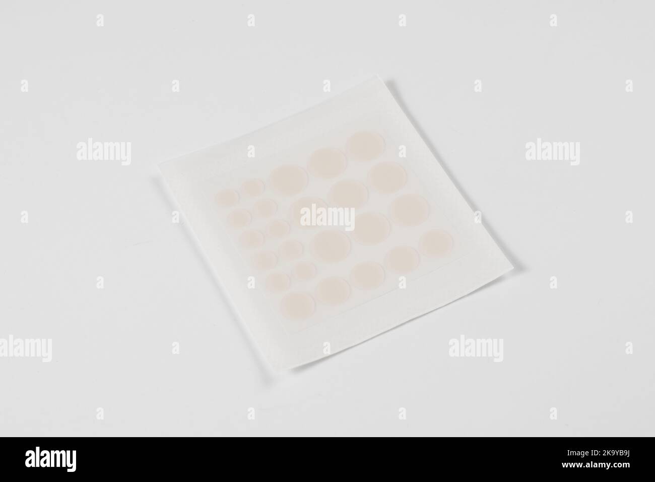 Set of round acne patches on white background. Close-up acne patch ...