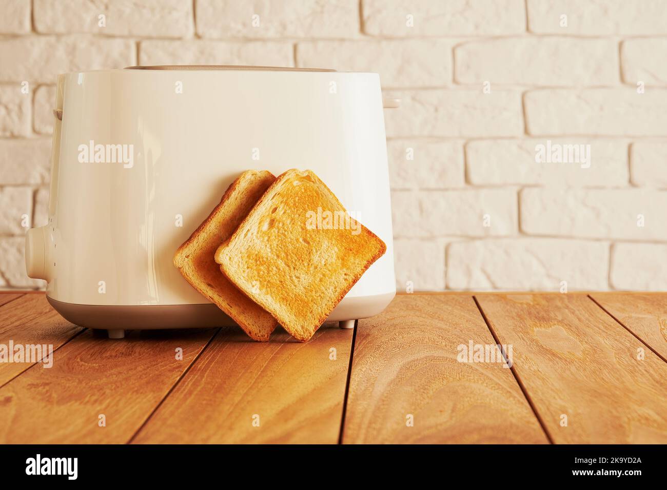 White electric toaster and toasted bread slices on the modern kitchen. Cooking and homeware ...