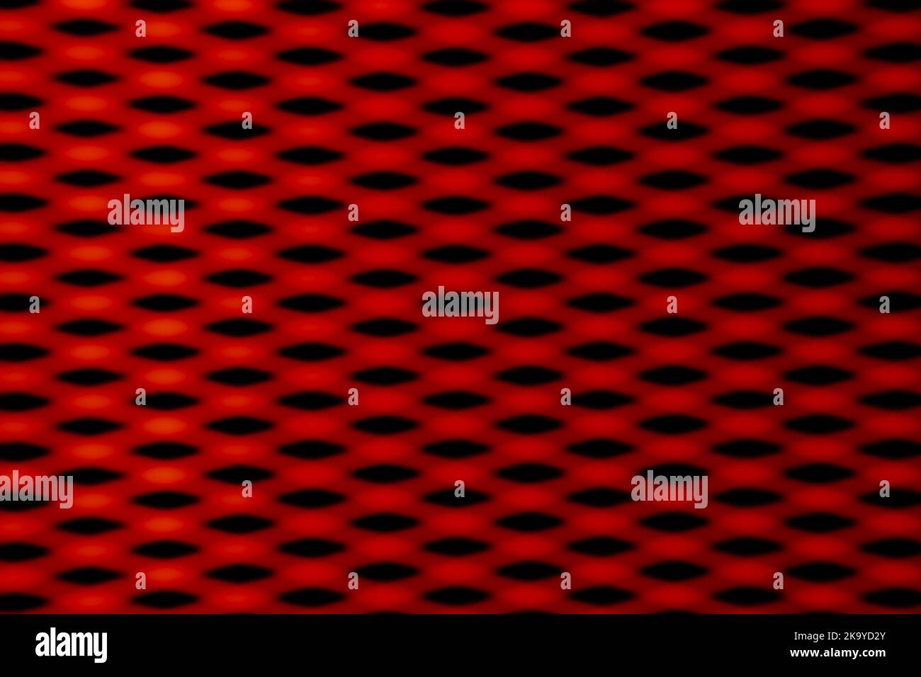 Red diagonal chequered grid pattern on black background Stock Photo - Alamy