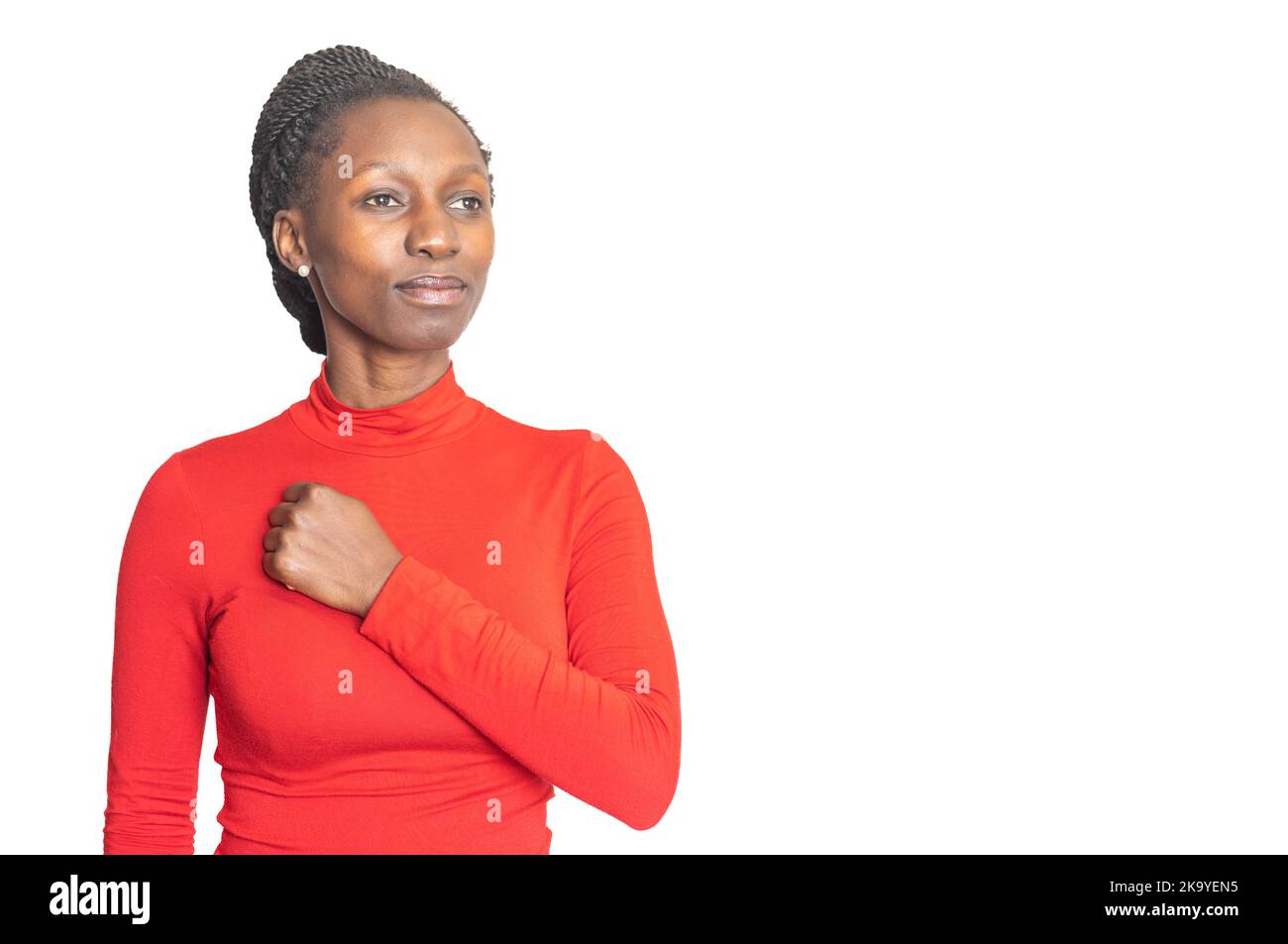 Woman hands on chest eyes closed Cut Out Stock Images & Pictures - Alamy