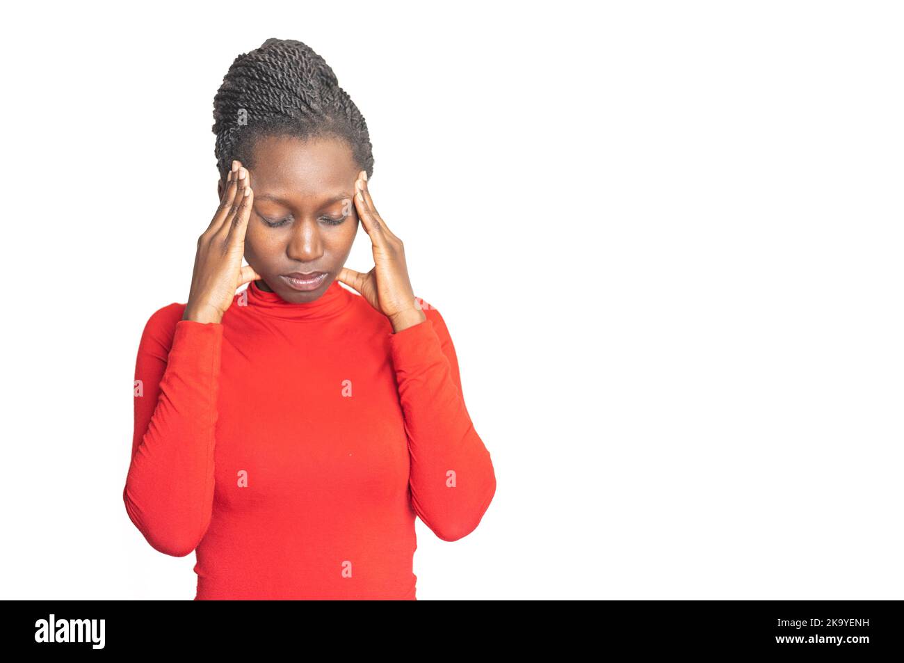 Young woman with a headache. Isolated white background Stock Photo - Alamy