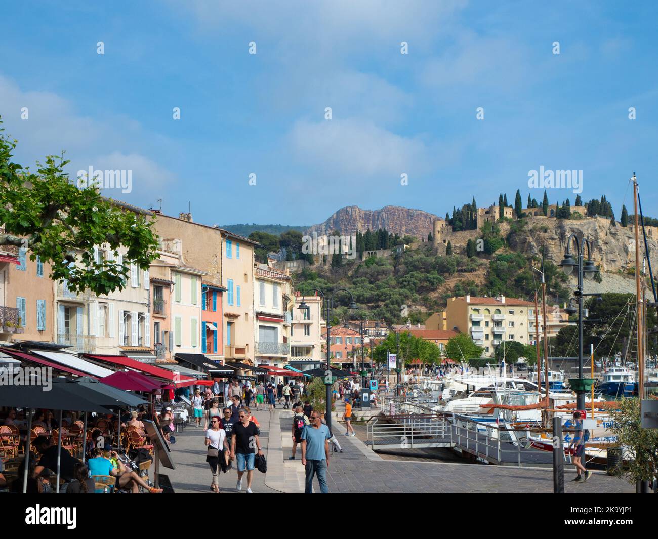 Cassis, France - May 18th 2022: Walking promenade between the old ...