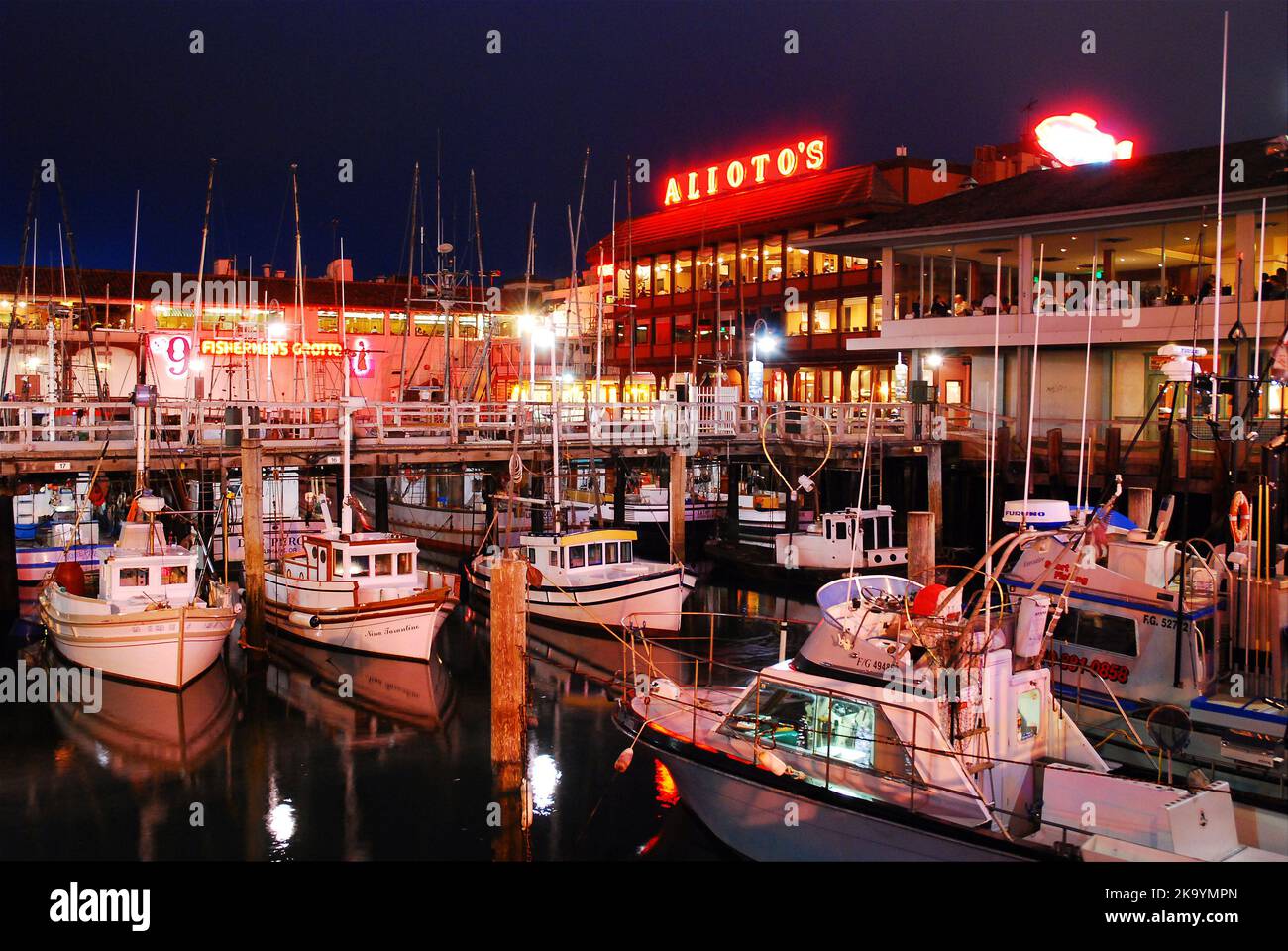 The small fishing fleet in Fisherman's Wharf of San Francisco sits in a ...