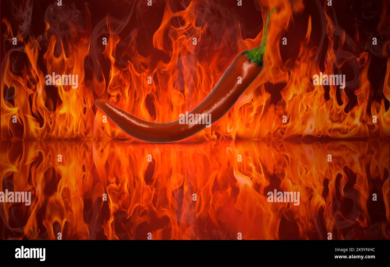 red chili pepper - fire background in reflection in the base Stock ...