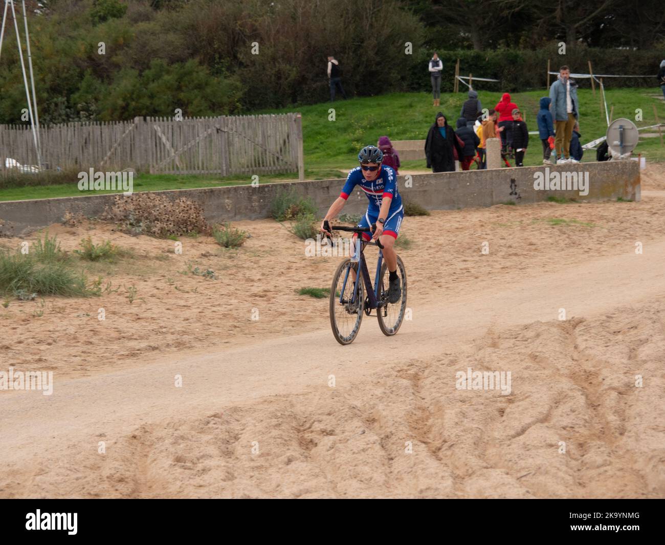 Ouistreham, France October 2022. Cycling on a beach Ouistreham in ...