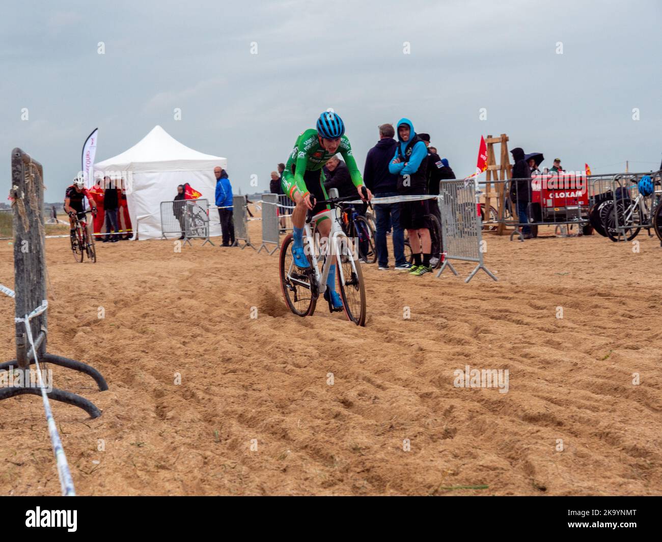 Ouistreham, France October 2022. Cycling on a beach Ouistreham in ...