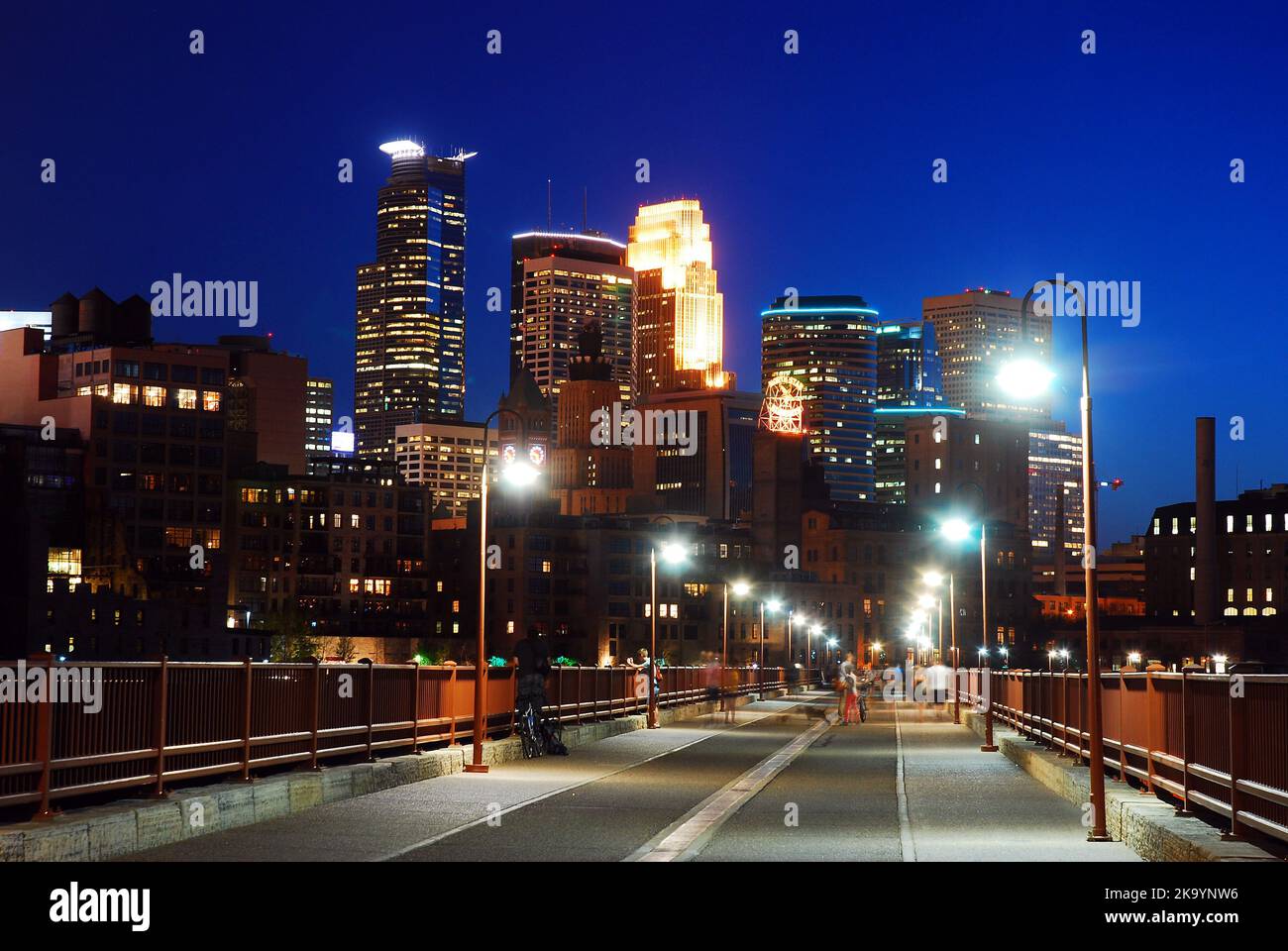 The Stone Arch Bridge Leads to the Minneapolis Skyline Stock Photo - Alamy