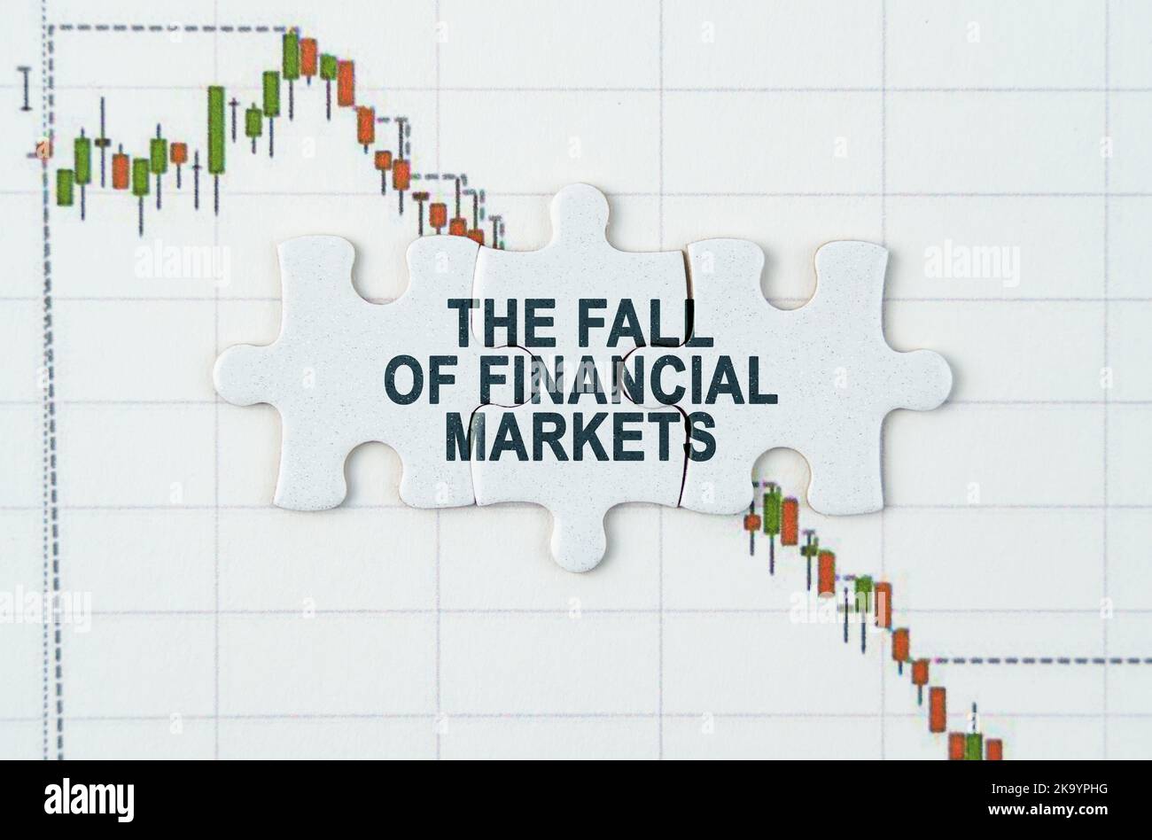 Business concept. On the quotes chart there are puzzles with the ...