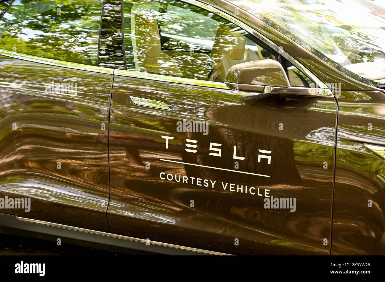 Amsterdam, Netherlands - August 2022: Sign on the side of a Tesla ...