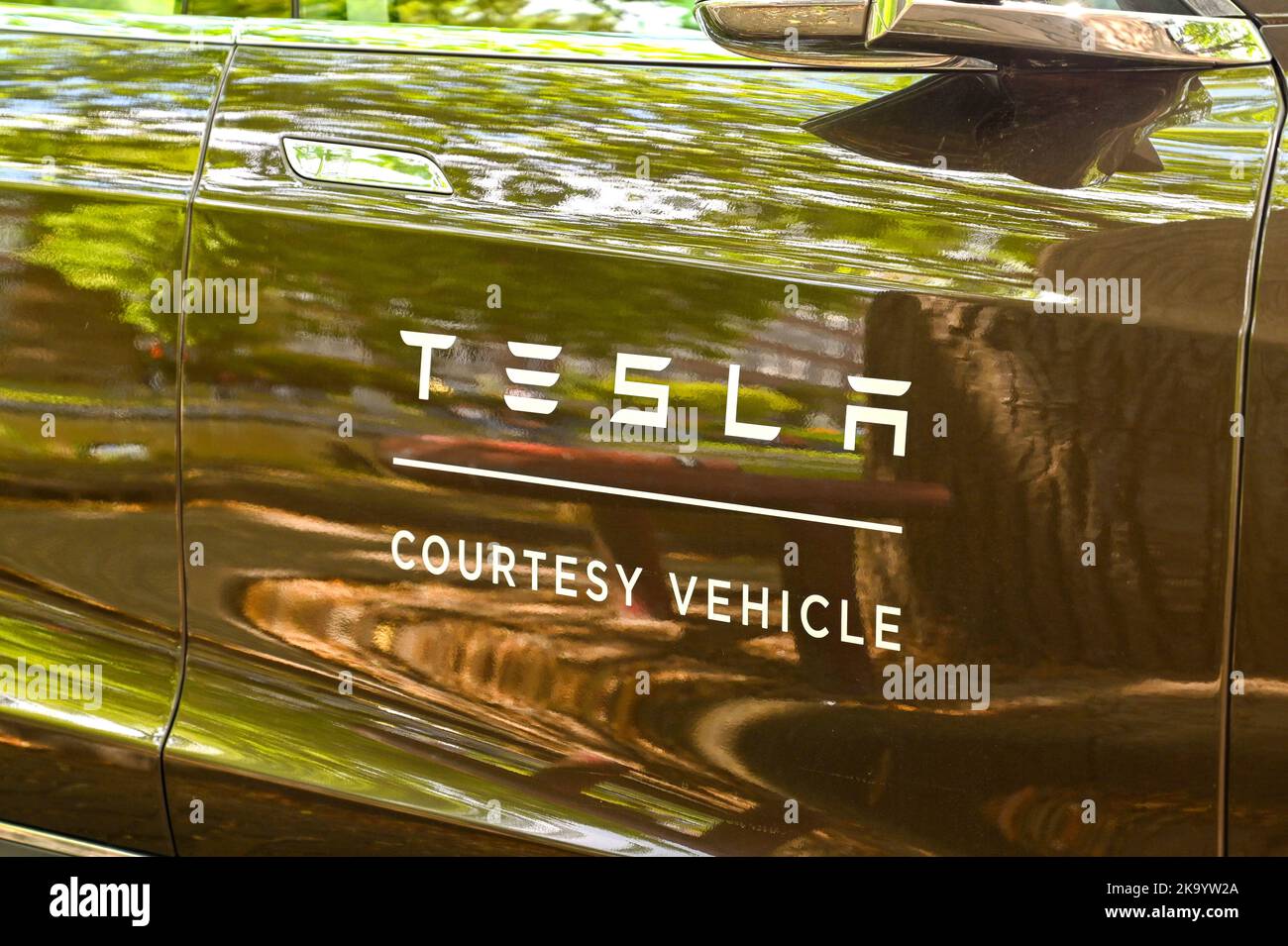 Amsterdam, Netherlands - August 2022: Sign on the side of a Tesla ...