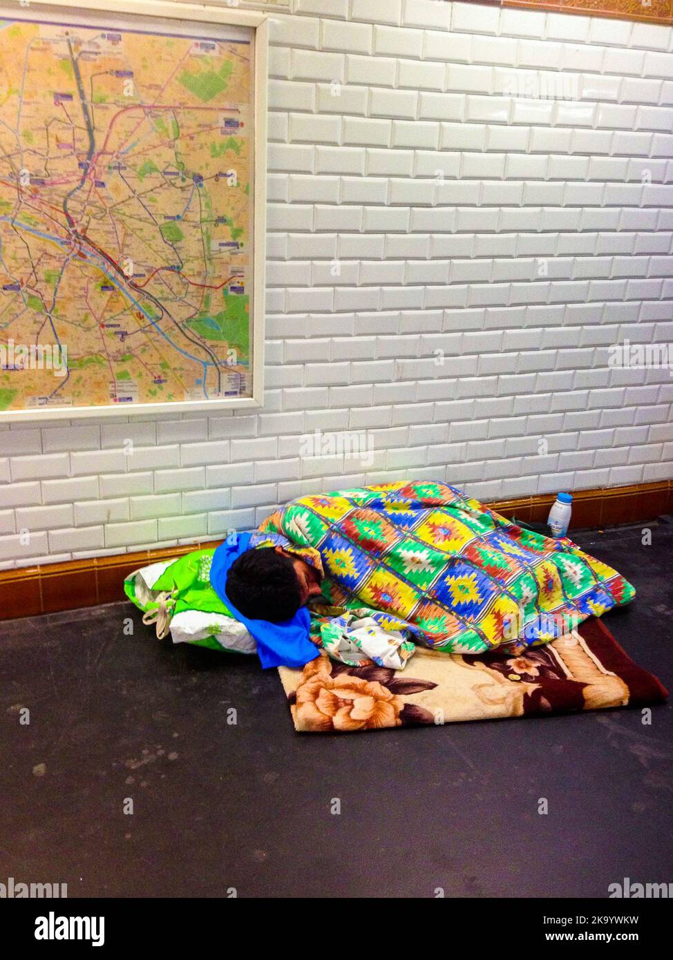 Paris, France, Homeless Man Sleeping on Platform of Paris Metro, ALone ...