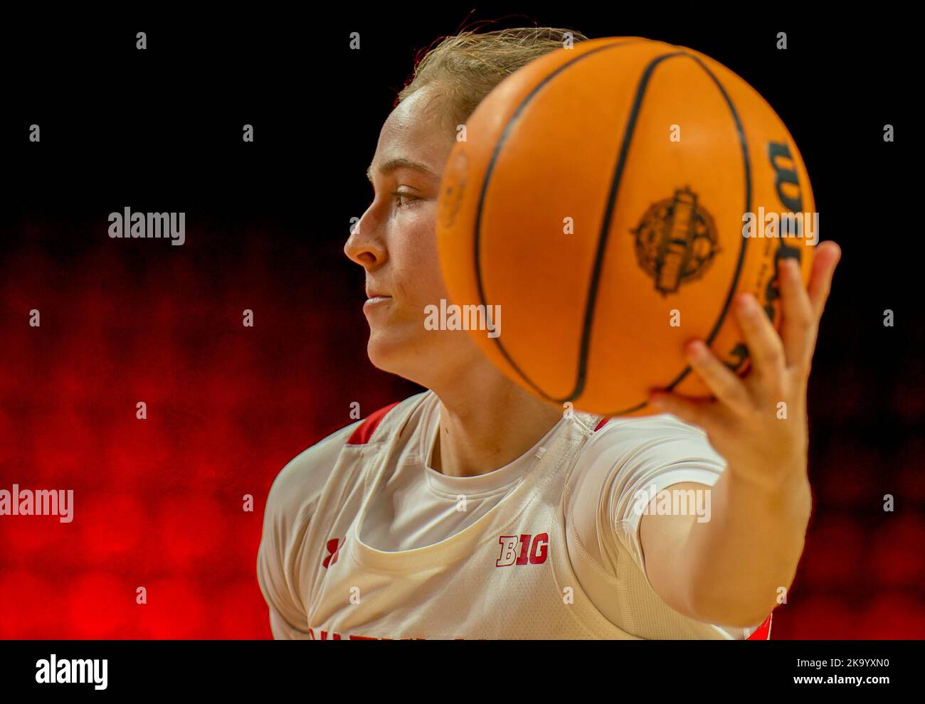 Ball bouncing behind a female basketball player Stock Photo - Alamy
