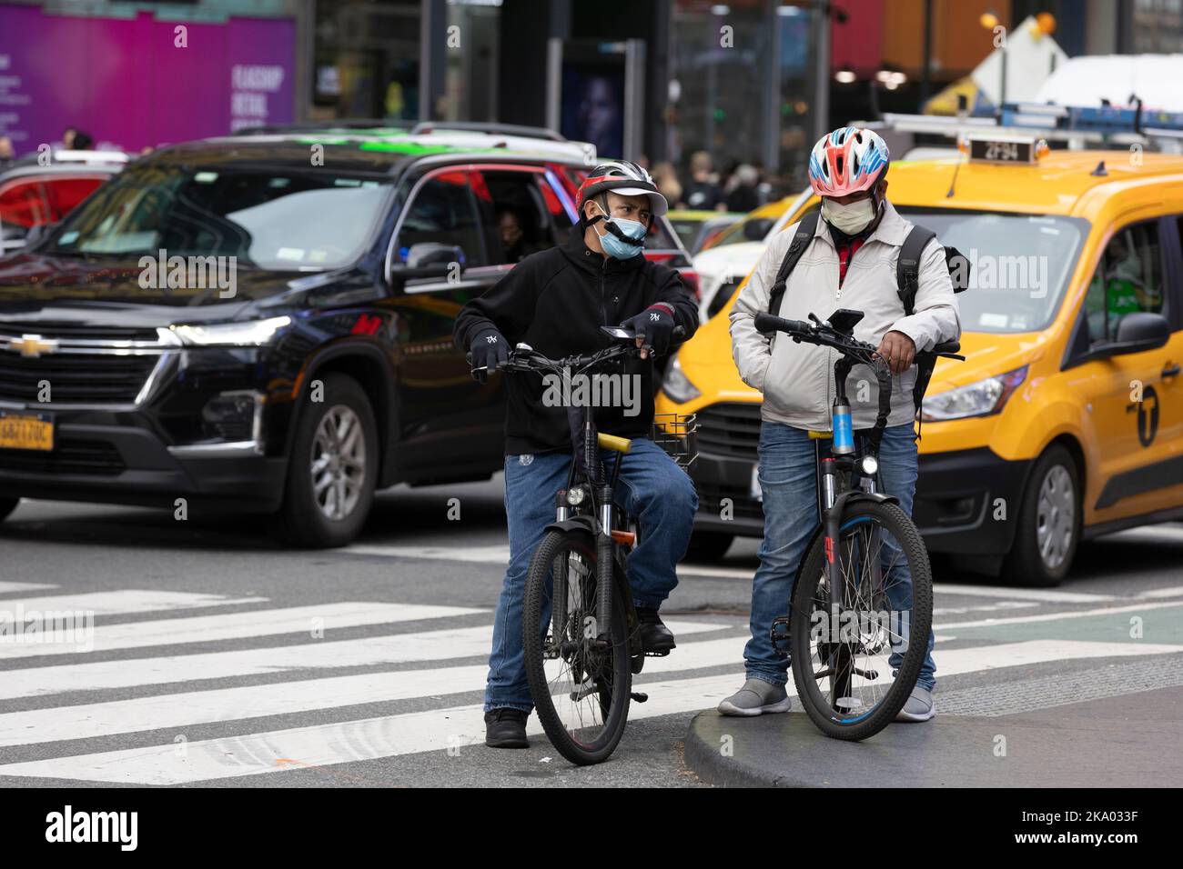 Bicycle delivery men, Manhattan, New York Stock Photo - Alamy