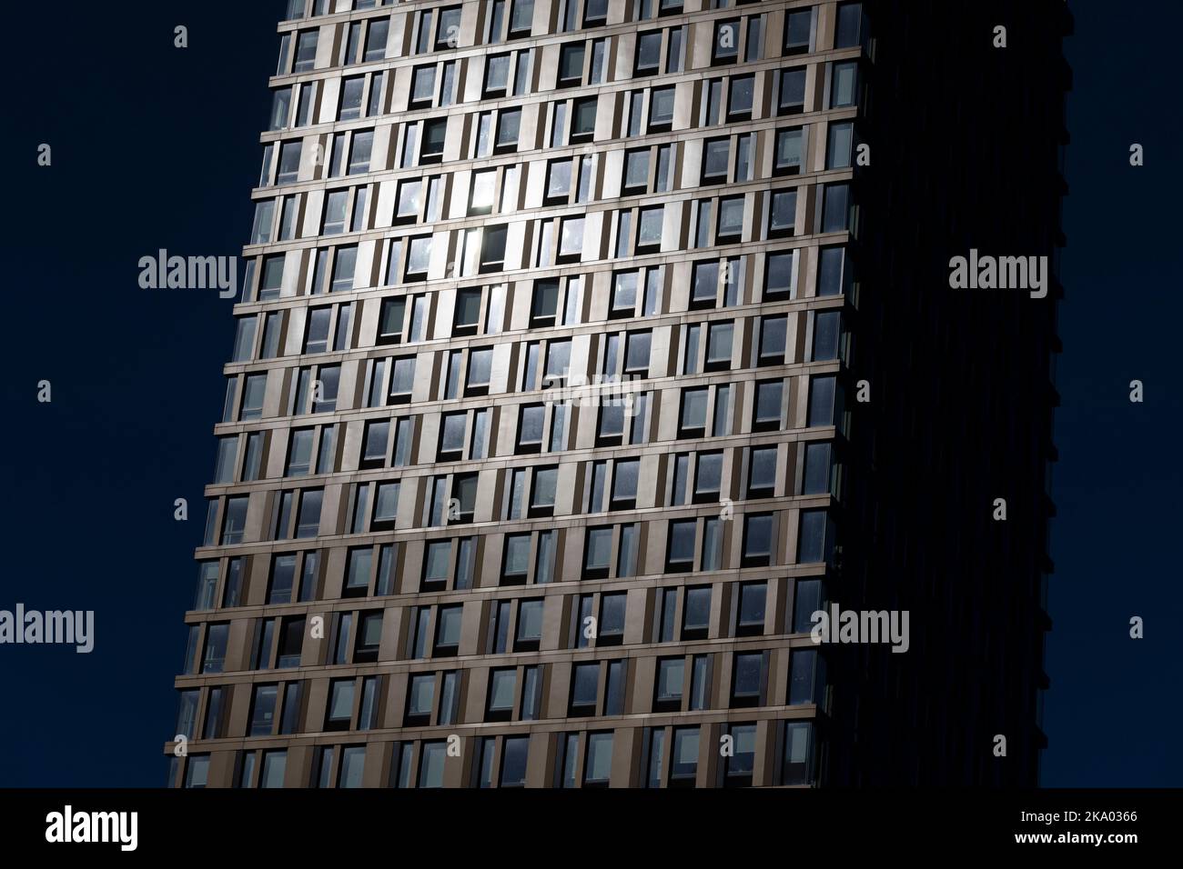 The sun reflects from an apartment building, Lower East Side, Manhattan ...