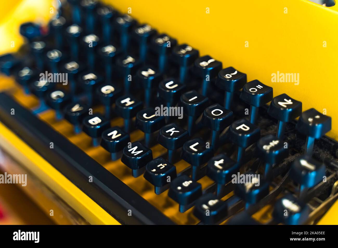 Closeup shot of black push-buttons with white letters of an old ...