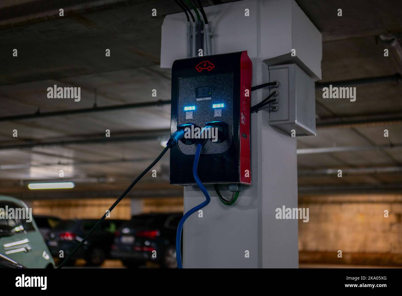 Dual charging box for electric vehicles in underground parking Stock ...