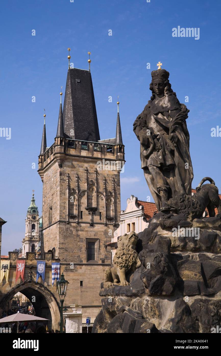 Statue of Saint Vitus and tower of Saint-Nicholas church, Lesser Town ...