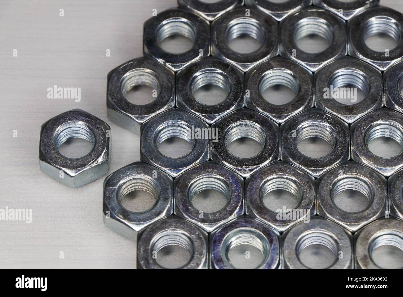 Threaded Metal Hex Nuts Sorted On White Surface Stock Photo - Alamy