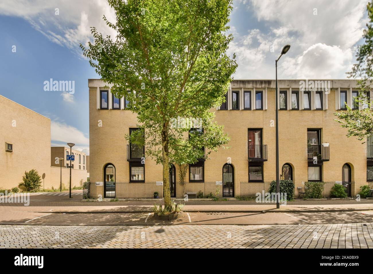 View of street near building with beauty of vegetation outside Stock ...