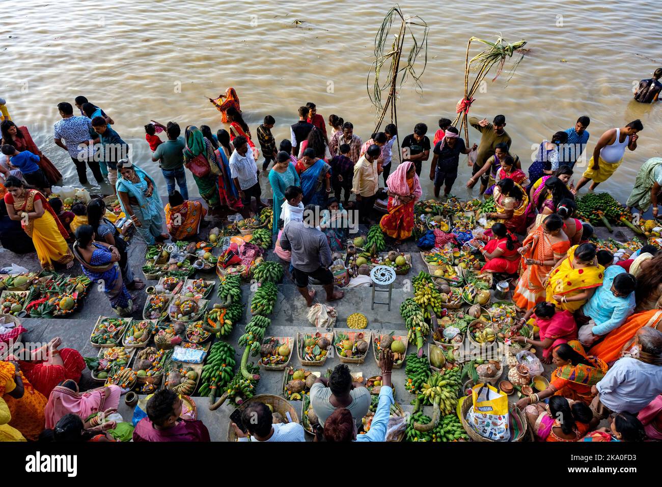 Hindu devotees are seen performing rituals on the occasion of chhath ...